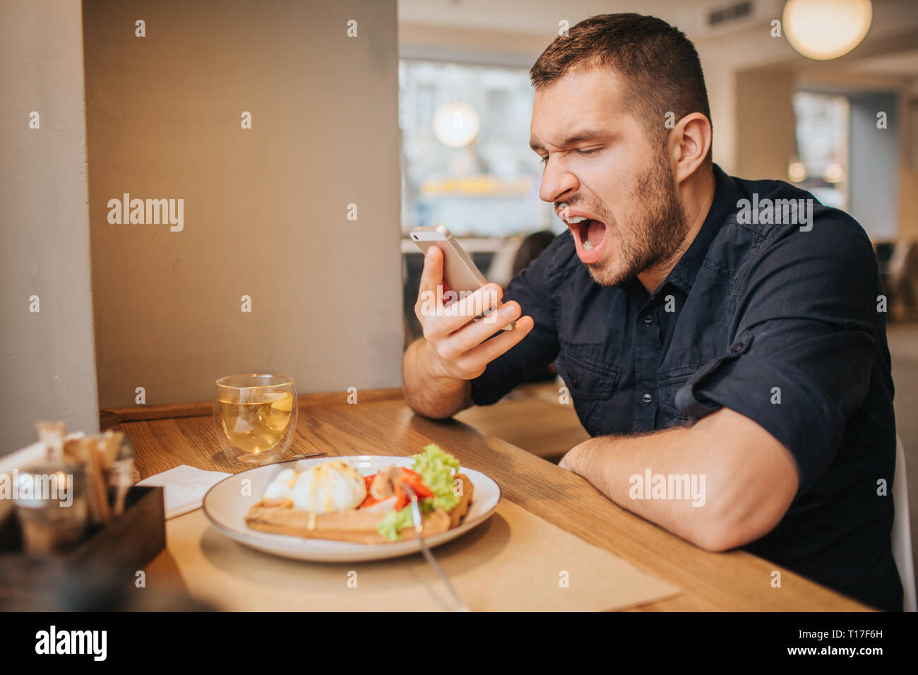 Man angry food plate hi-res stock photography and images - Alamy