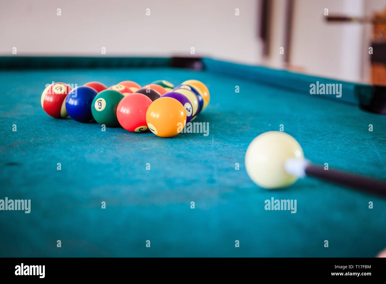 Billard balls and table in a bar Stock Photo - Alamy