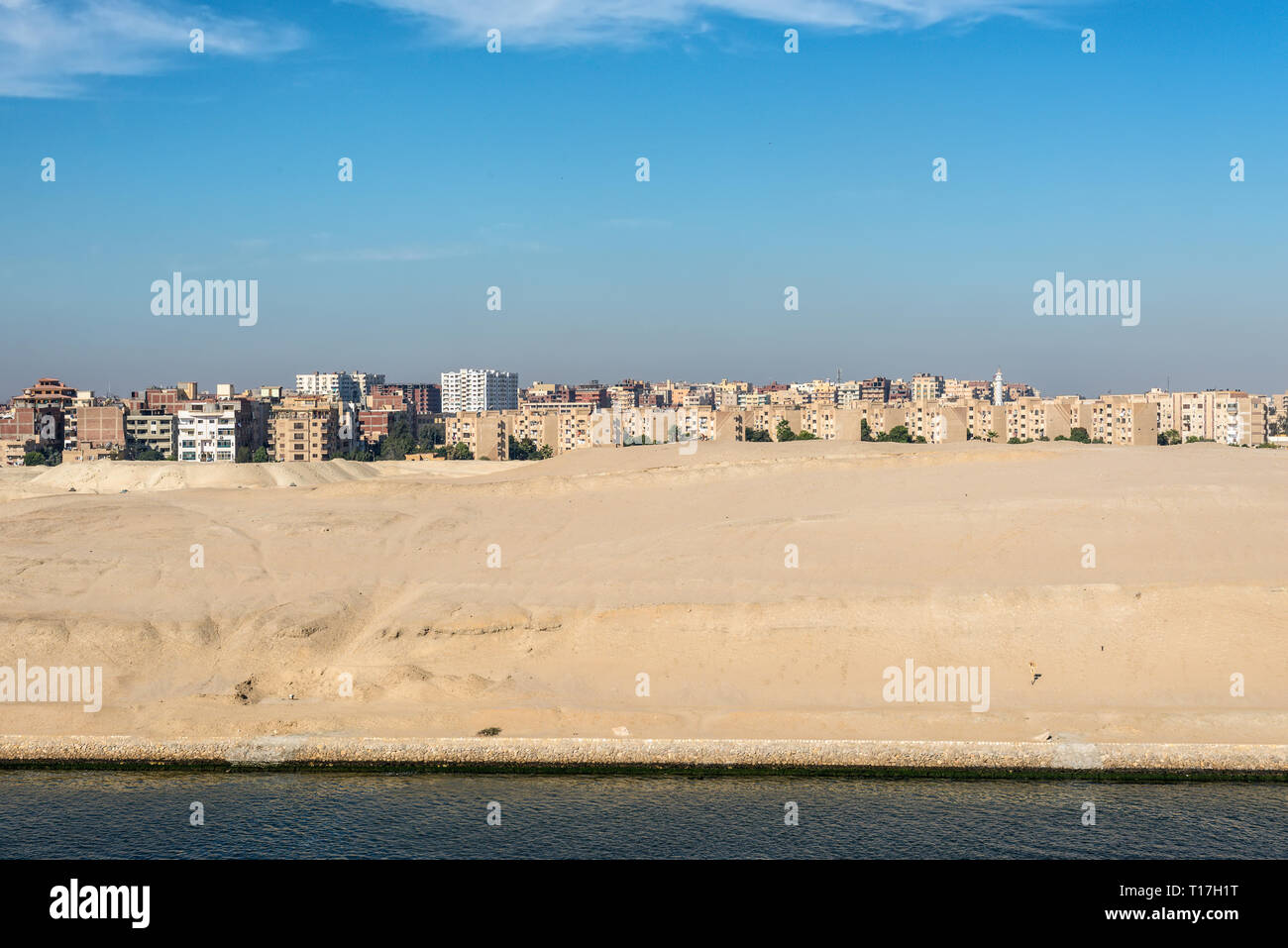 Residential buildings on the shore of Suez Canal in Ismailia, Egypt ...