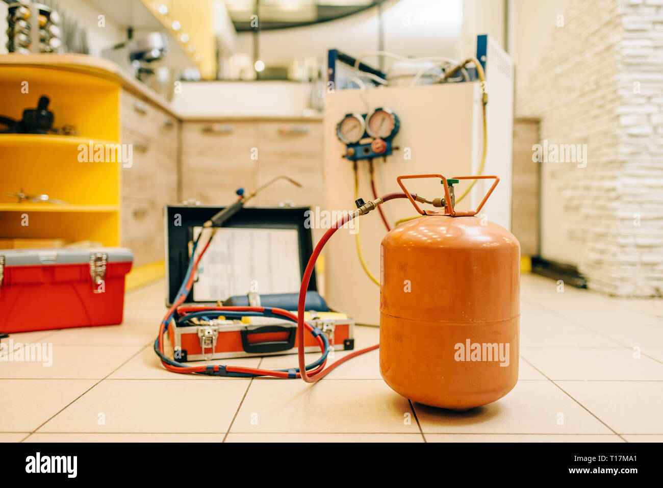 Tools for repairing of refrigerator cooling system Stock Photo - Alamy