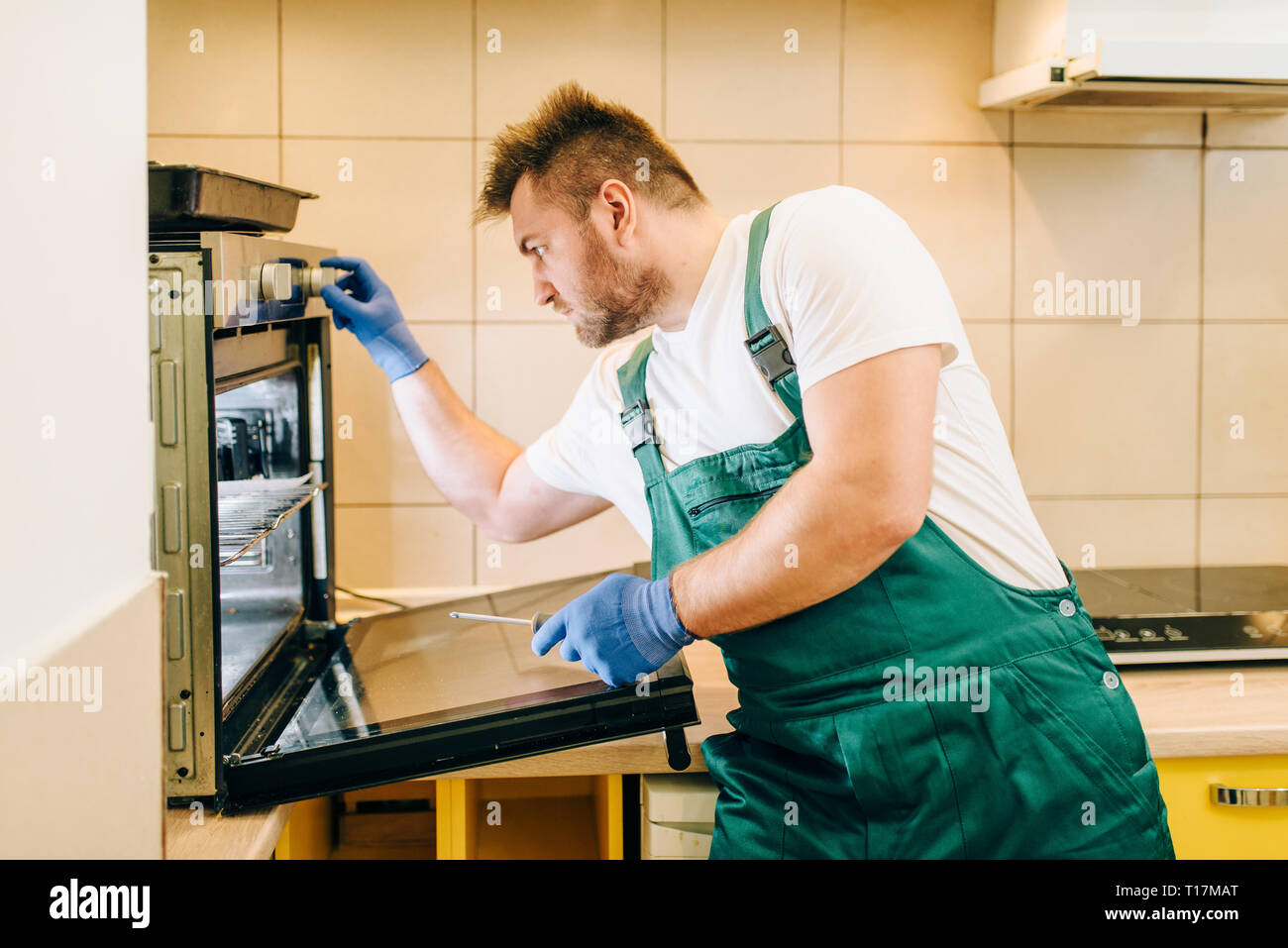 Oven technician hi-res stock photography and images - Alamy