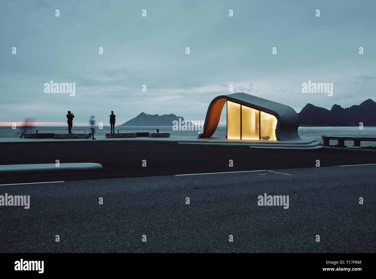 Tourists at the wave shaped concrete and glass architecture of ...