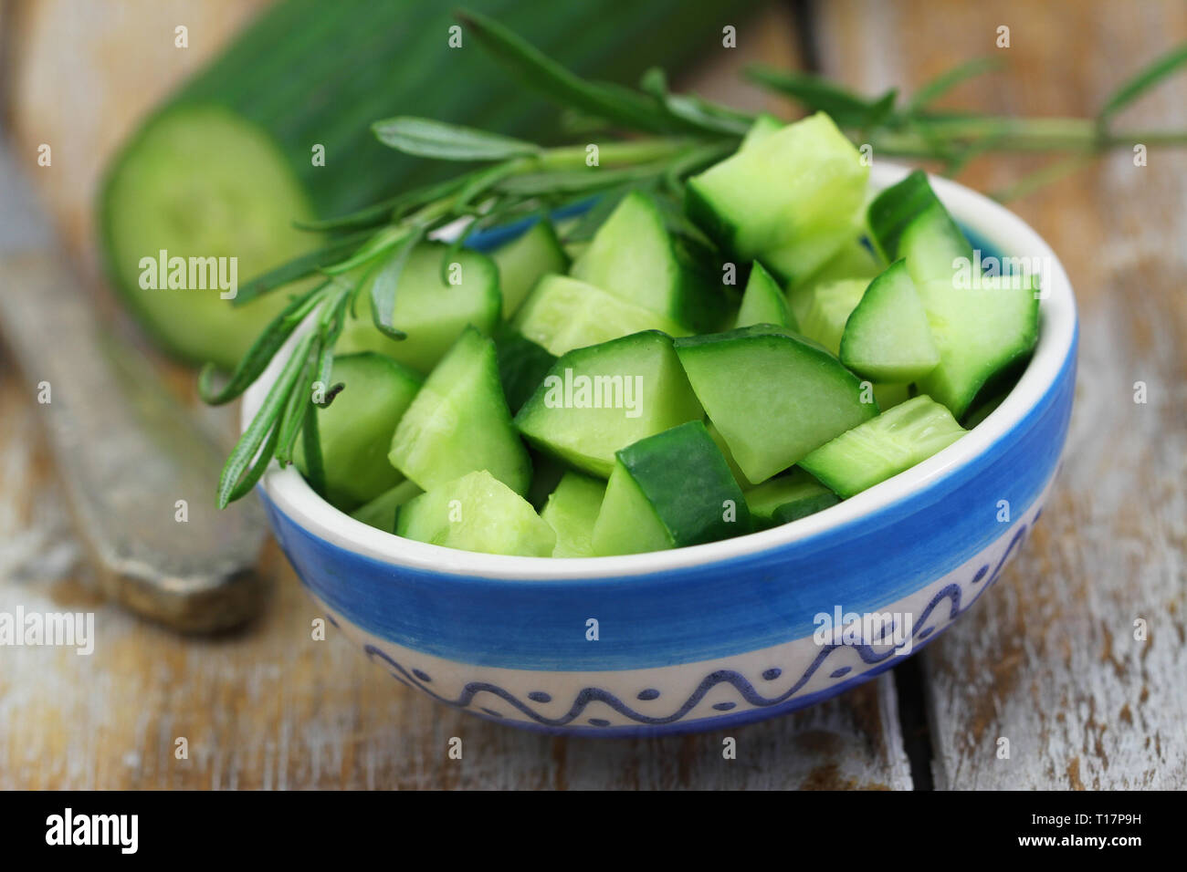 Cucumber cubes in bowl hi-res stock photography and images - Alamy