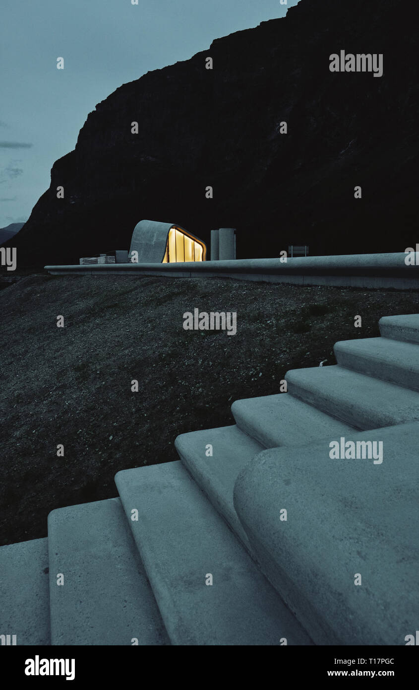 The wave shaped concrete and glass restroom architecture of ...