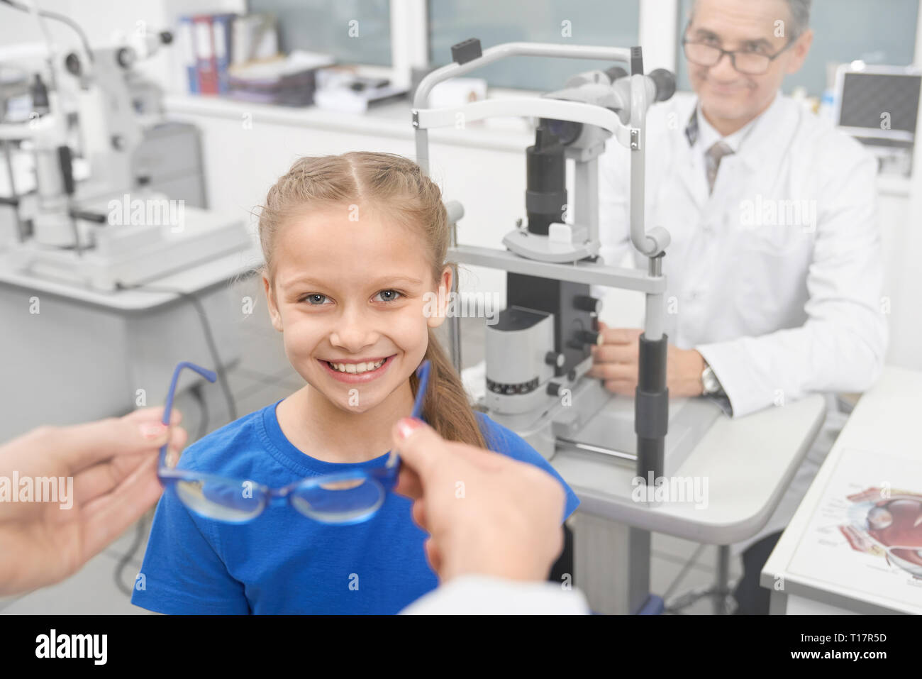 Beautiful girl optometrist smiling posing hi-res stock photography and ...