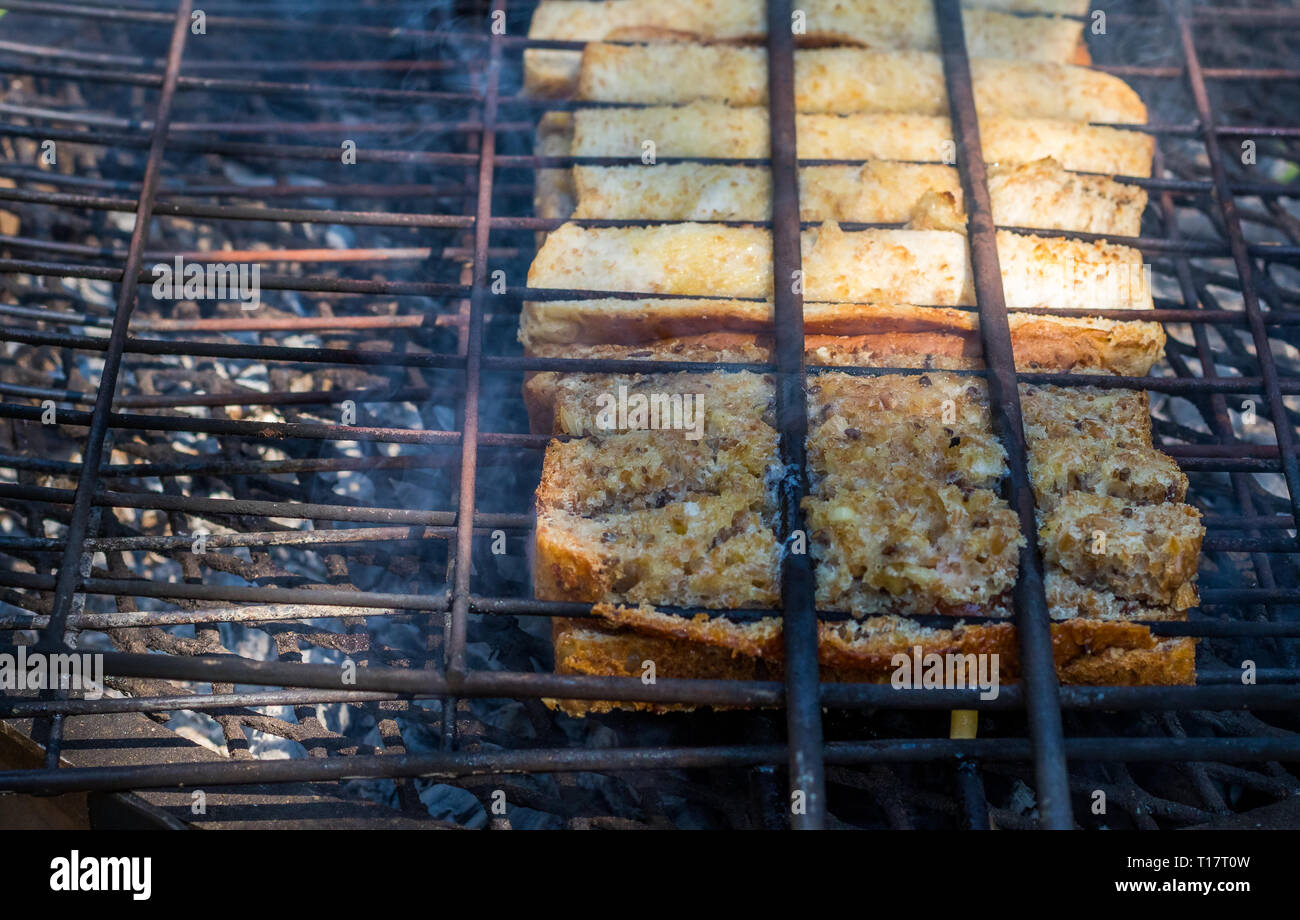 Traditional South African toasted sandwiches known as braai broodjies ...