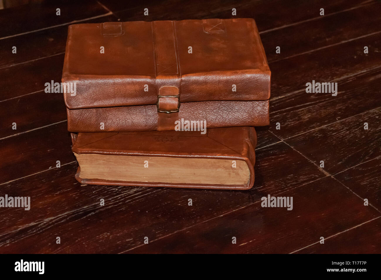 Leather books table hi-res stock photography and images - Alamy