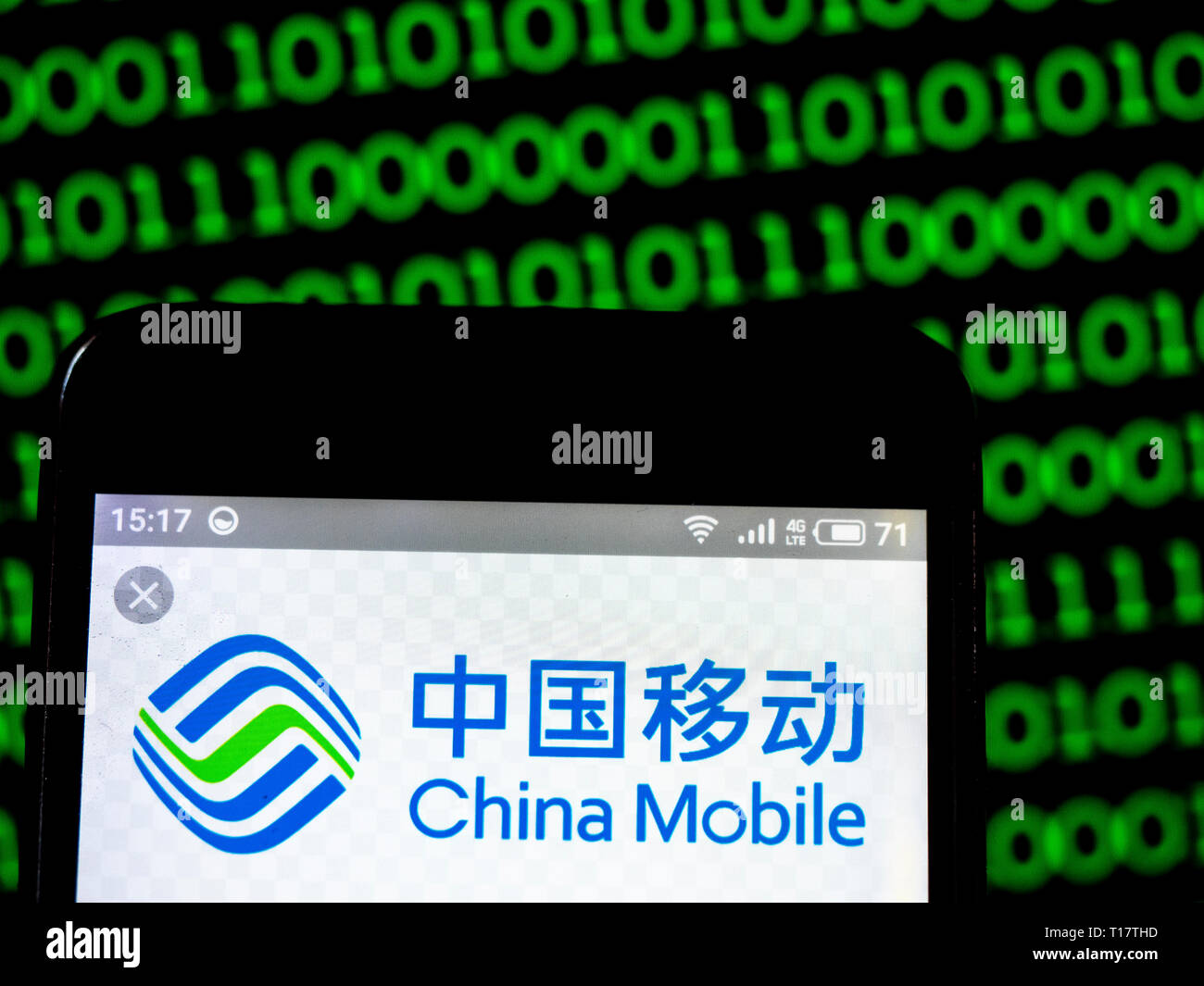 In this photo illustration a China Mobile Limited logo seen displayed ...