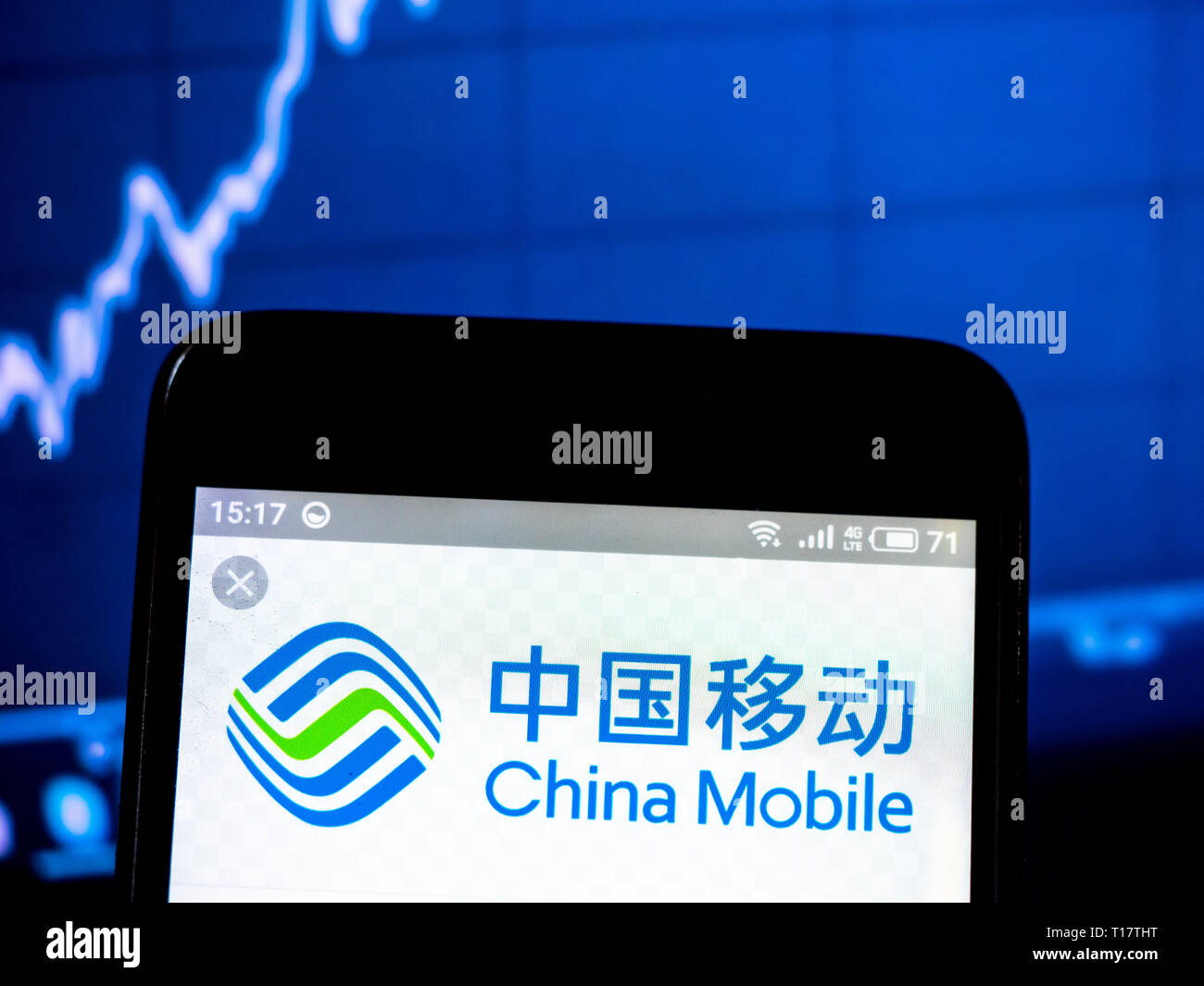 In this photo illustration a China Mobile Limited logo seen displayed ...