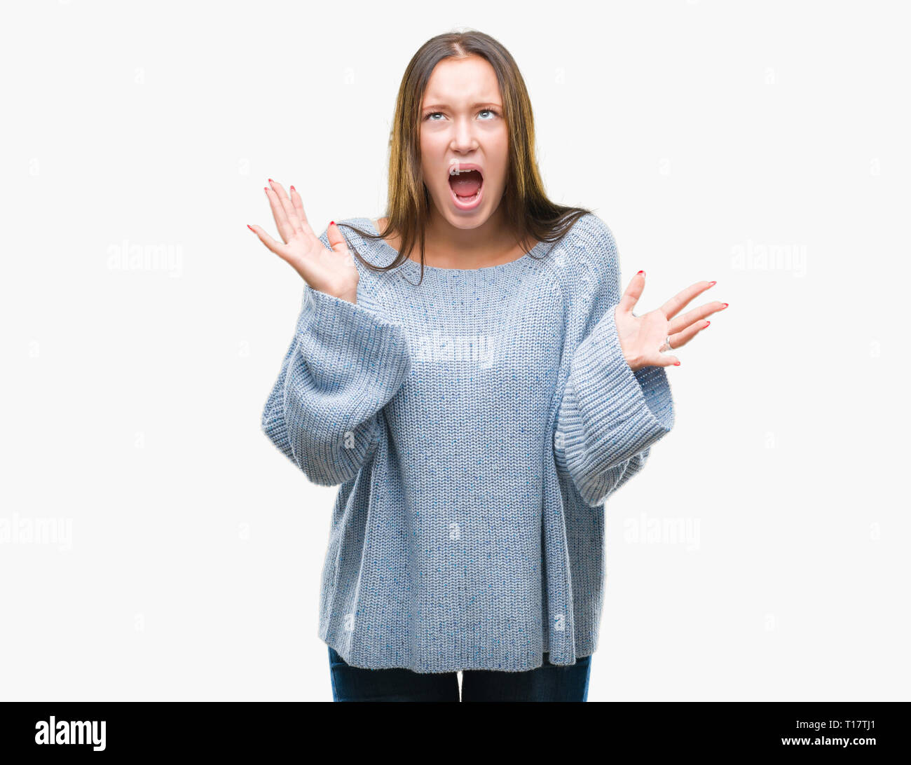 Young beautiful caucasian woman wearing winter sweater over isolated ...