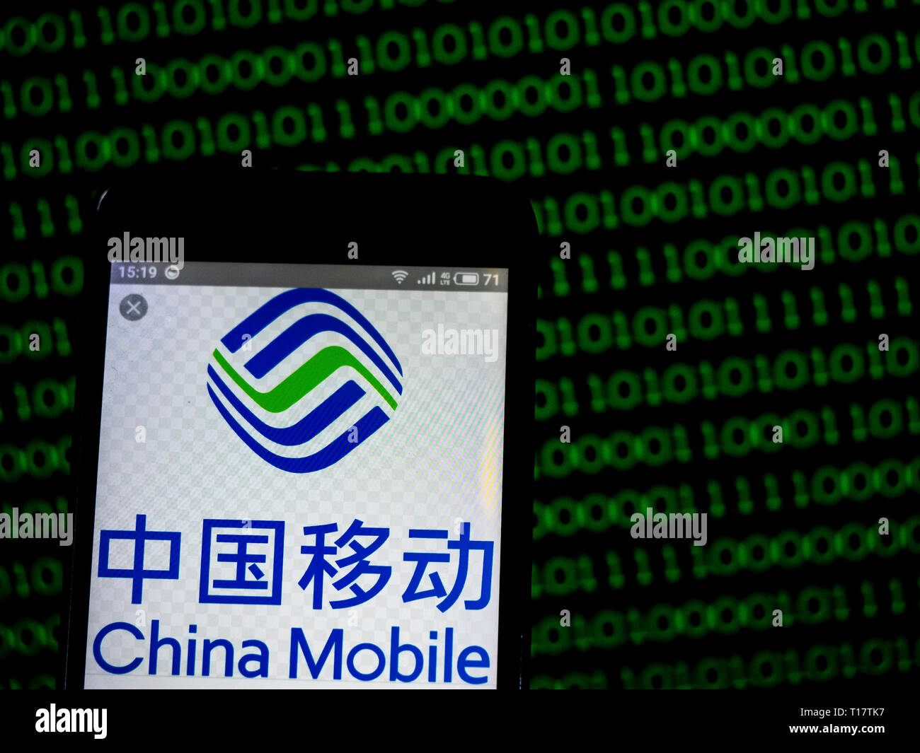 In this photo illustration a China Mobile Limited logo seen displayed ...