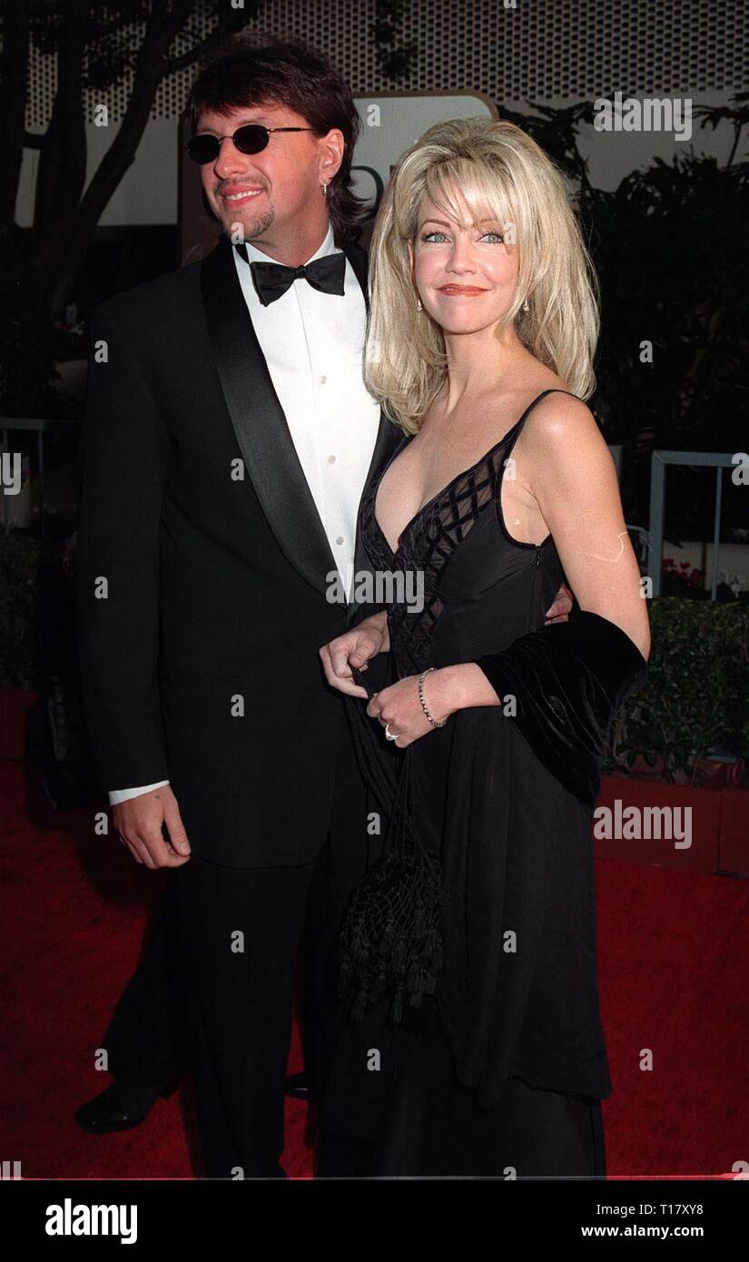 LOS ANGELES, CA. January 20, 1997: Actress Heather Locklear & husband ...