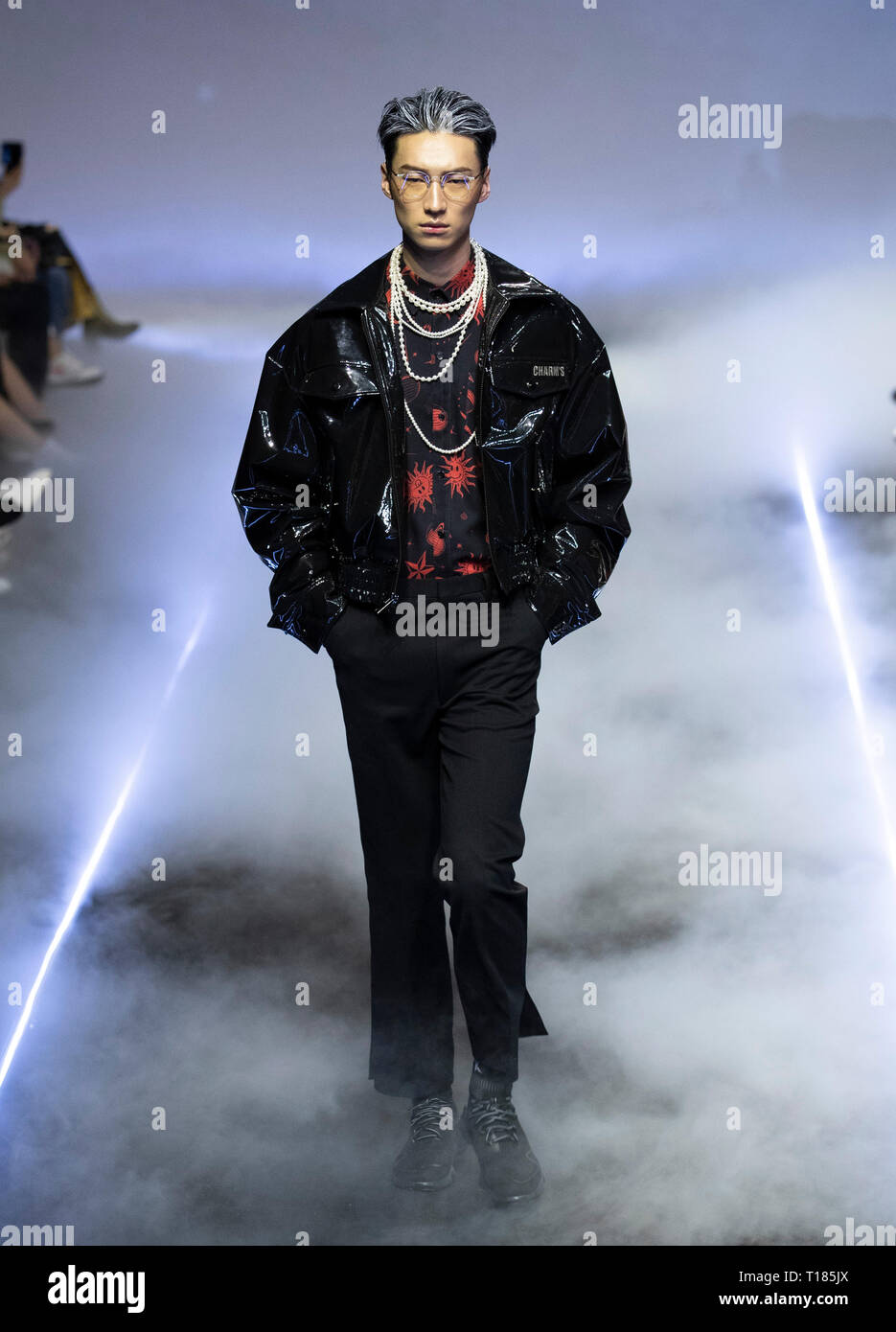 Seoul, South Korea. 24th Mar, 2019. A model presents a creation of ...