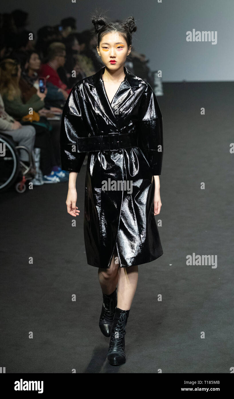 Seoul, South Korea. 24th Mar, 2019. A model presents a creation of ...