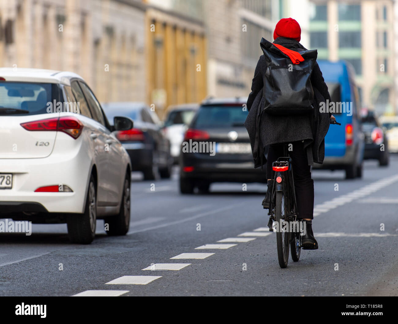 Berlin, Germany. 22nd Mar, 2019. A cyclist rides along a cycle path ...