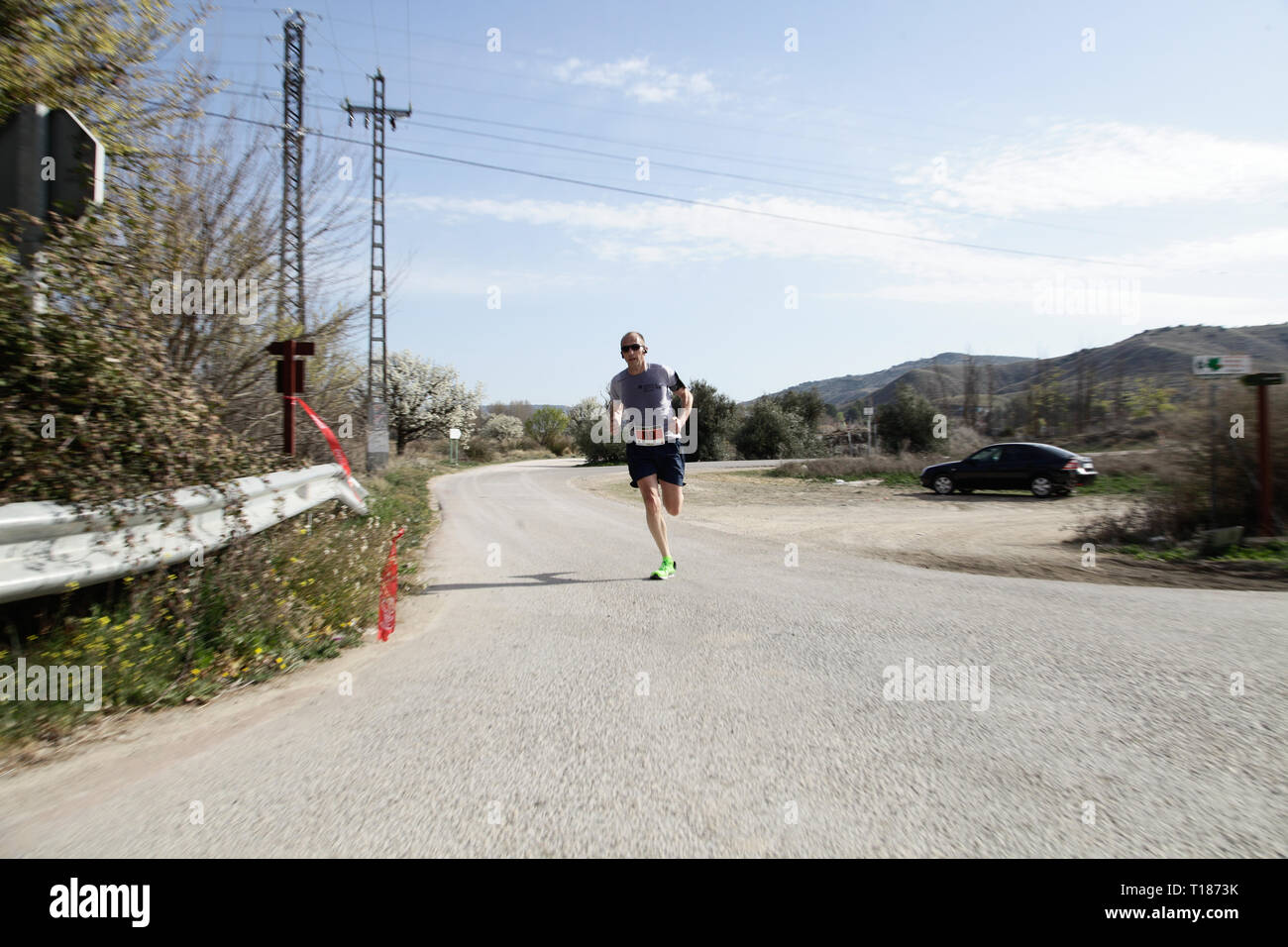 Madrid, Spain. 24th Mar 2019. Third participant of the marathon vias ...