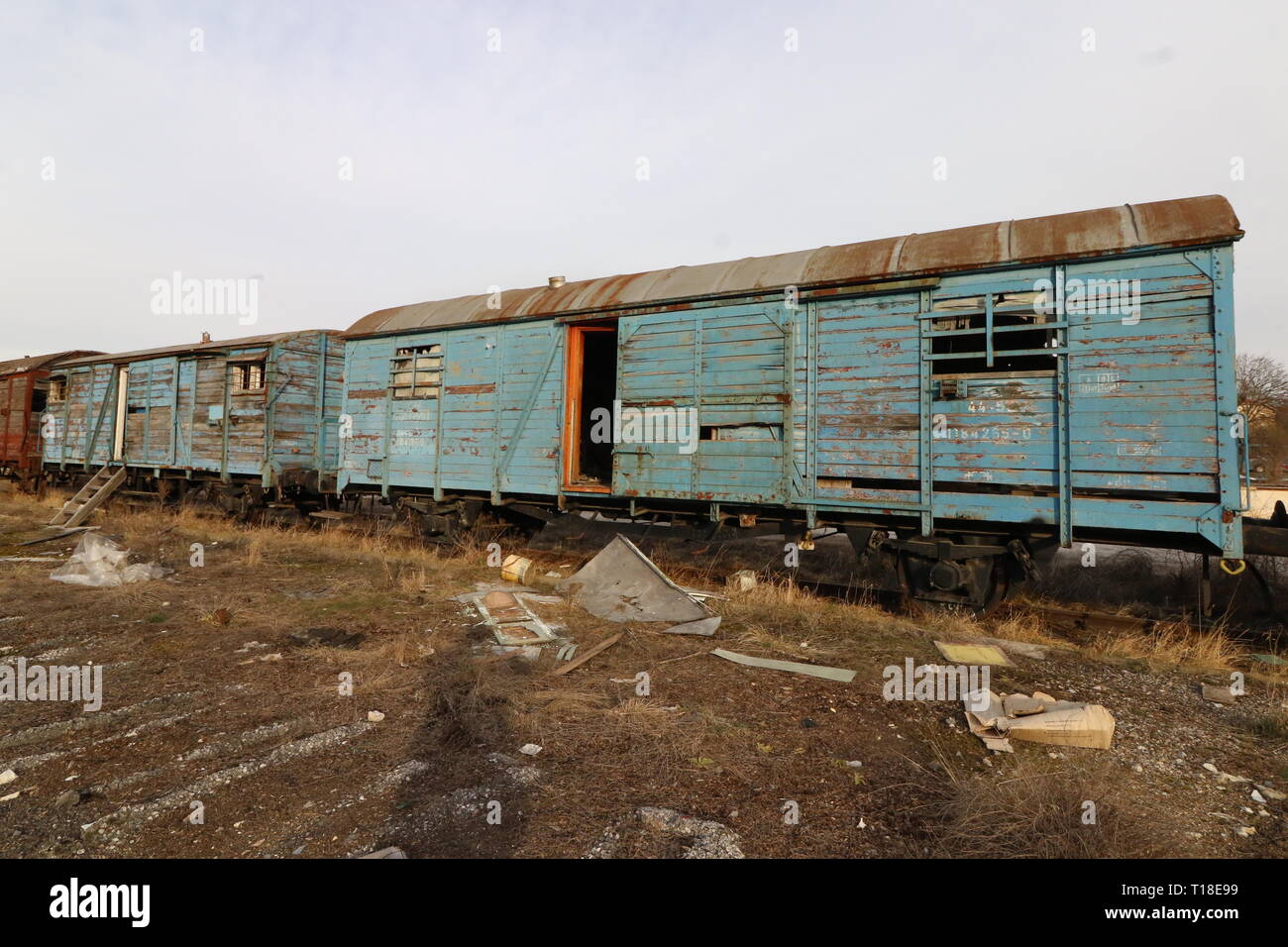 Abandoned old railway wagons at station, old train wagons in an ...