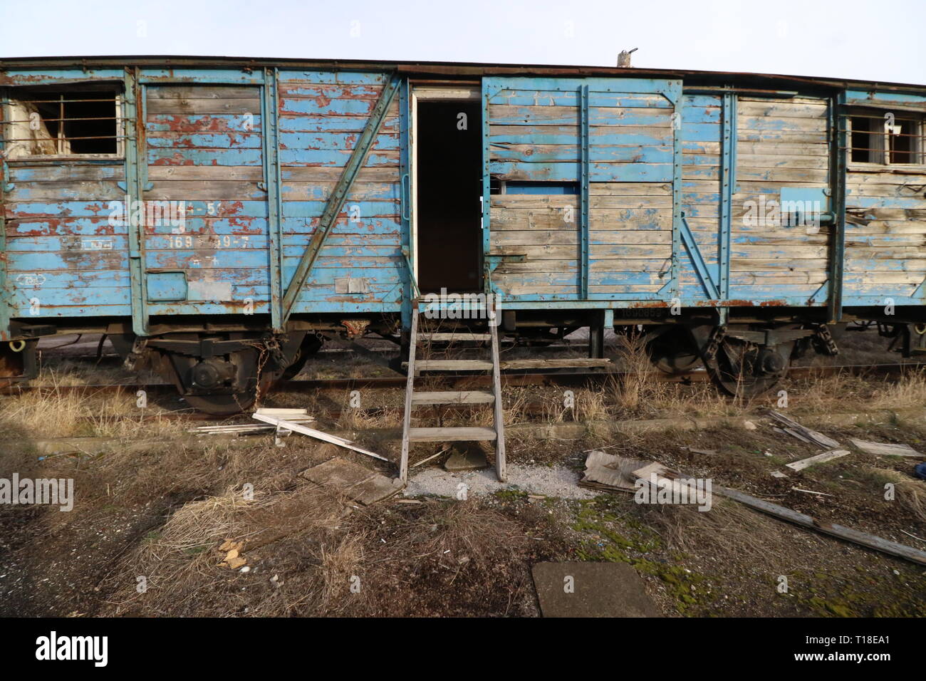 Abandoned old railway wagons at station, old train wagons in an ...