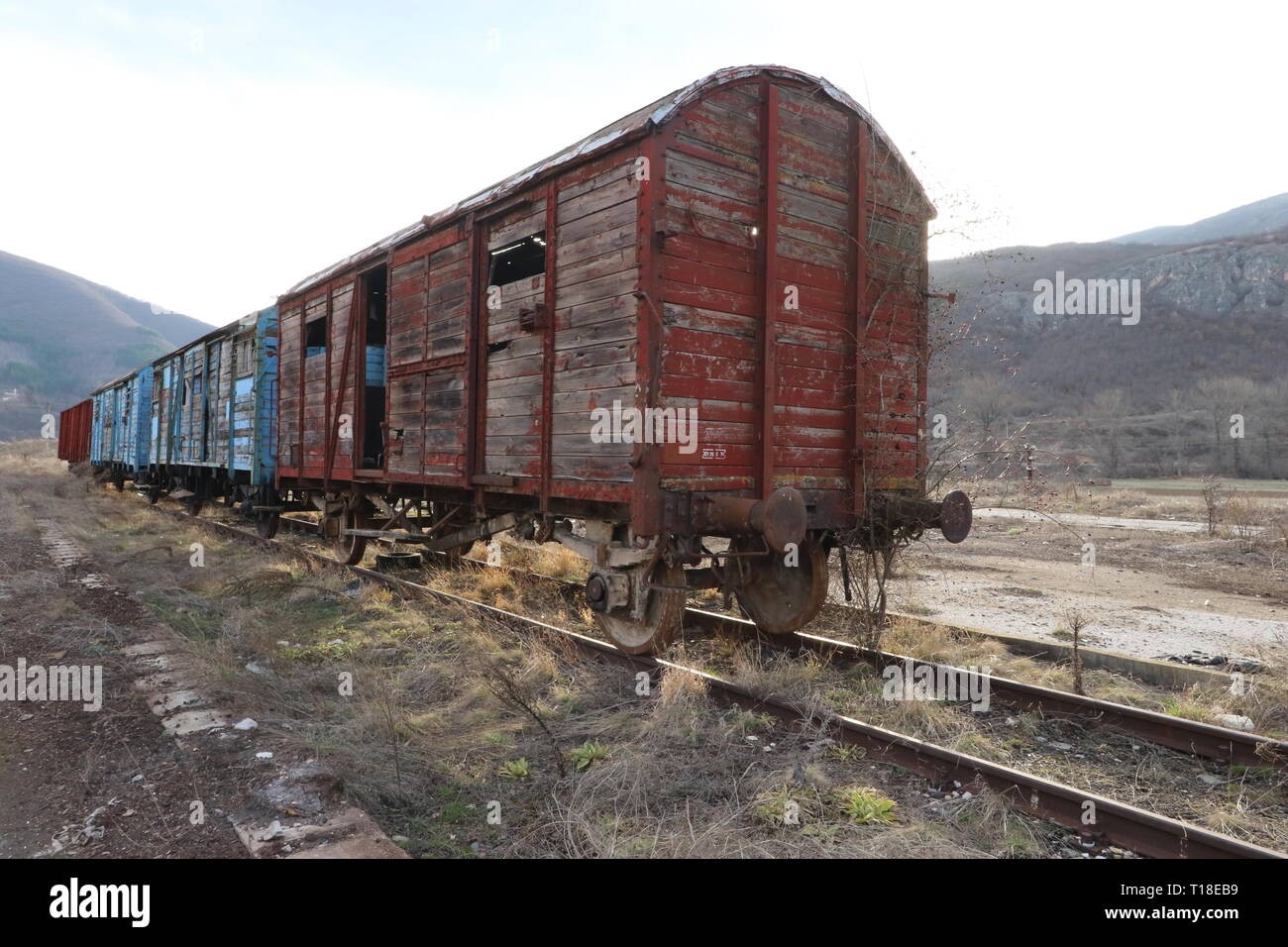 Abandoned old railway wagons at station, old train wagons in an ...
