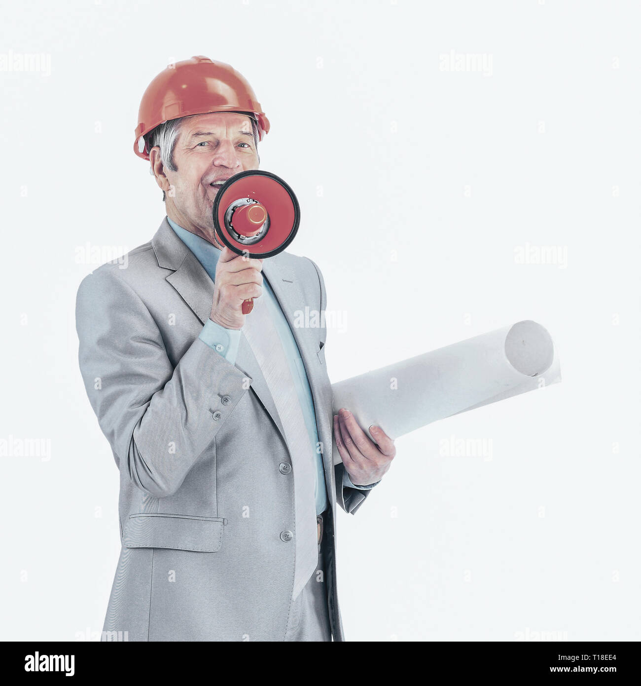 engineer in hard hat with a megaphone and drawings on a white ...