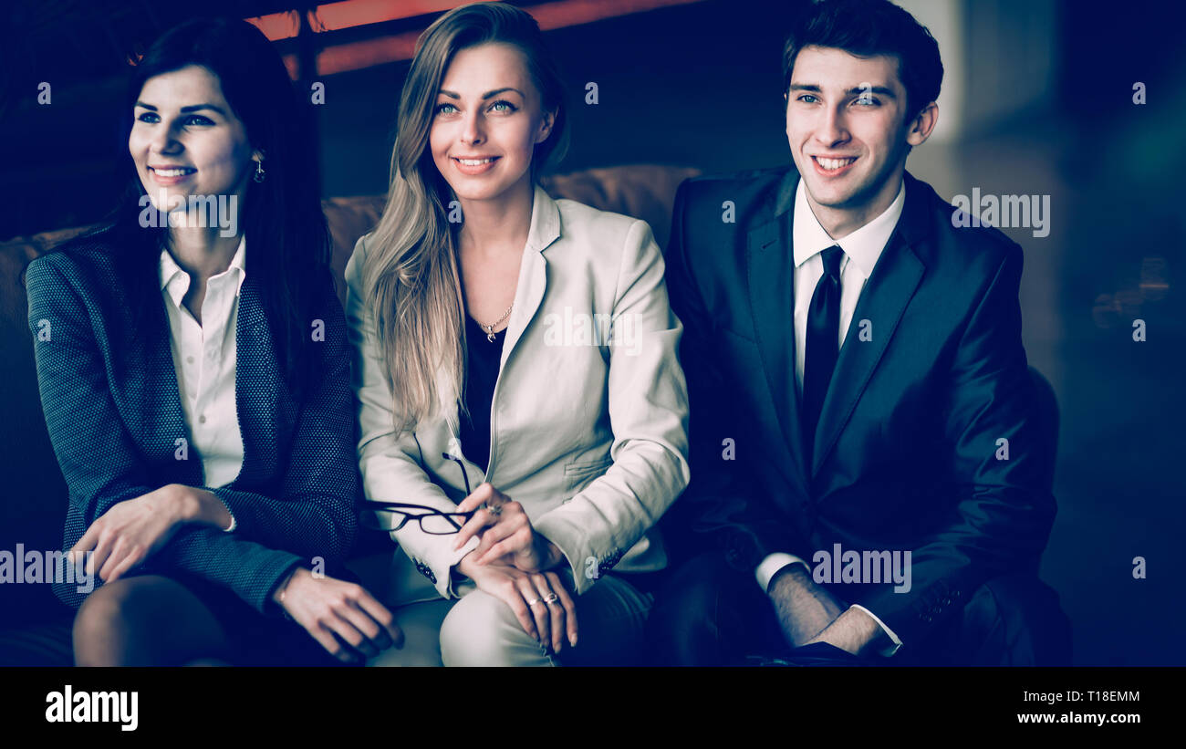 Portrait of a successful business team against a modern office ...
