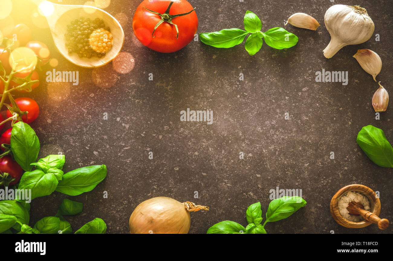 Italian food ingredients. Herbs and seasoning spices on dark stone ...