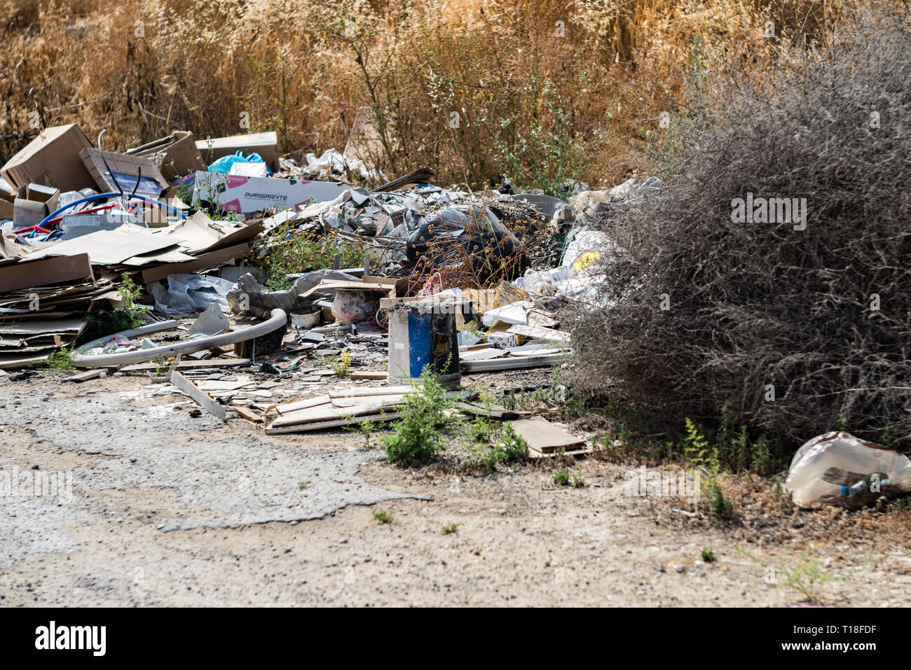 Garbage thrown away in natural area - forest part - illegal dumping ...