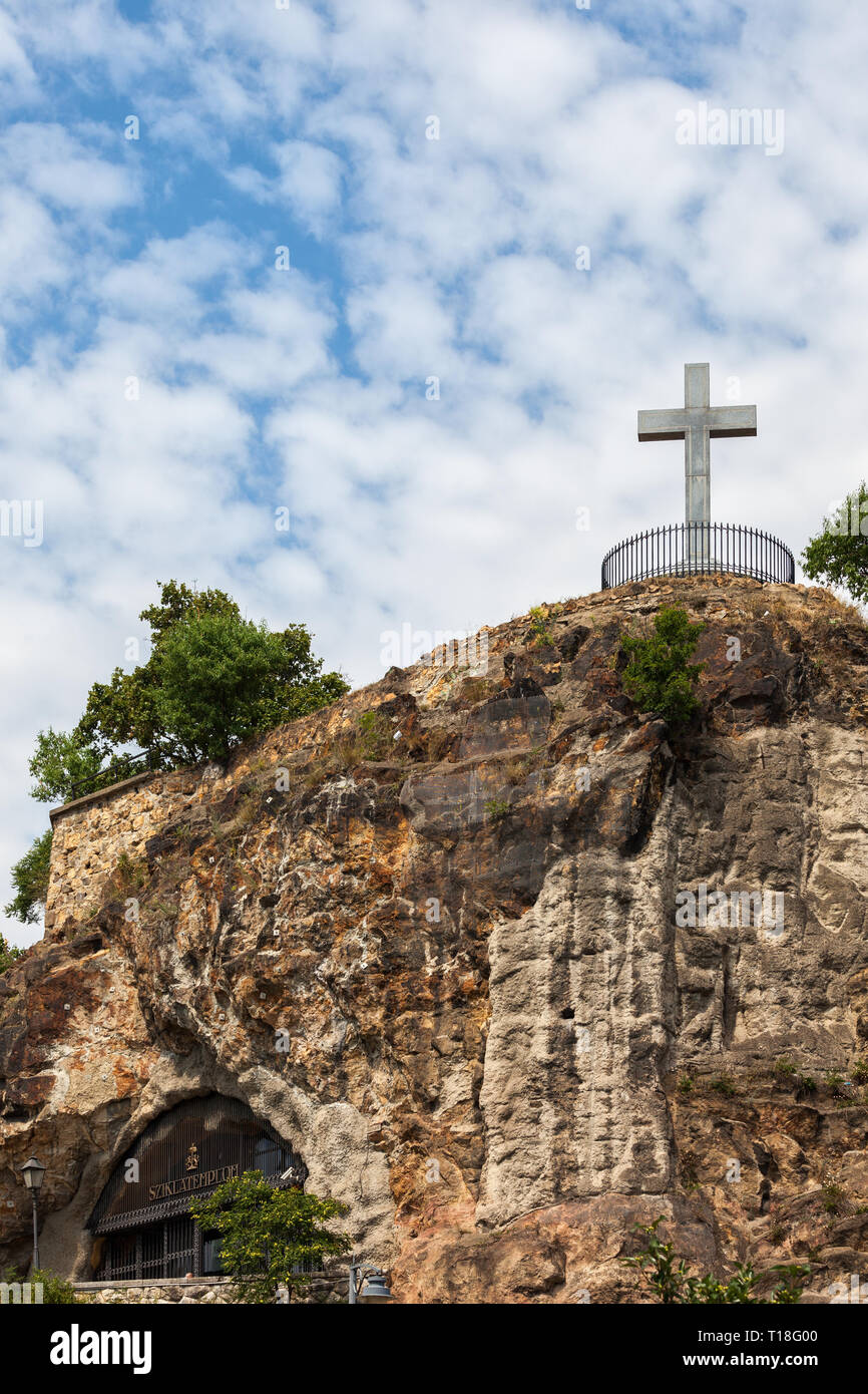 Cross above the cave hi-res stock photography and images - Alamy