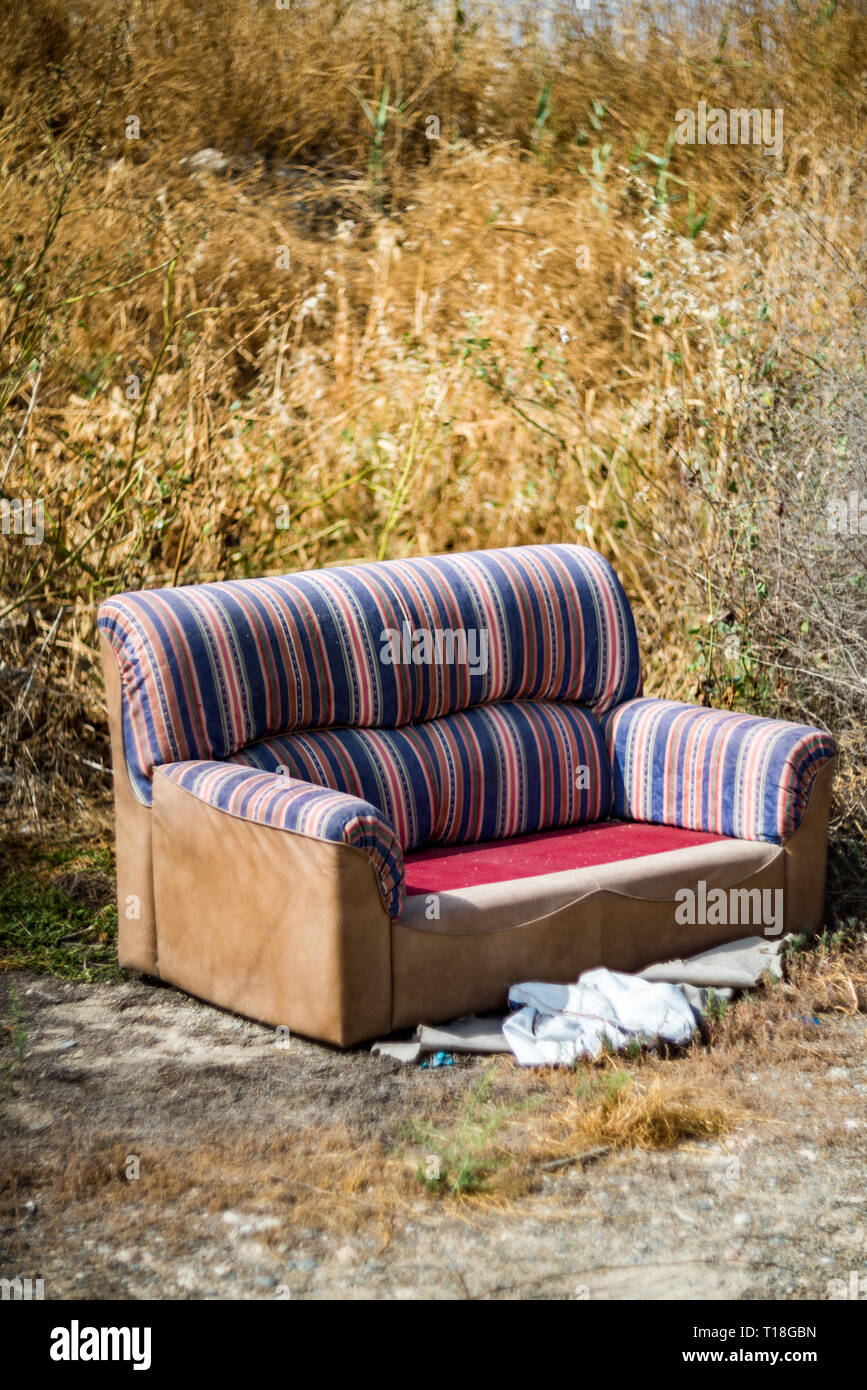 Sofa thrown away hi-res stock photography and images - Alamy