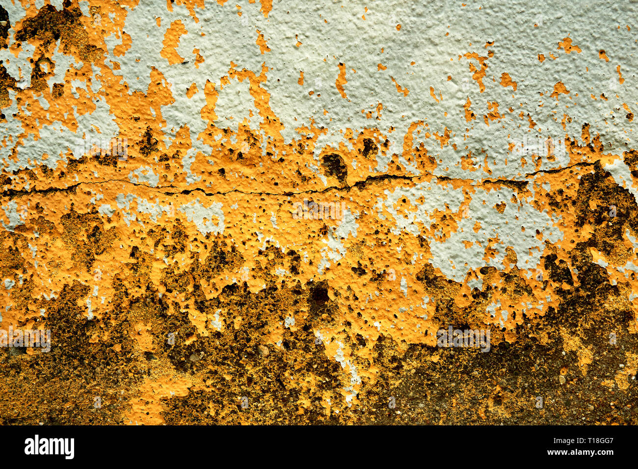 cracked color on a wall outside Stock Photo - Alamy