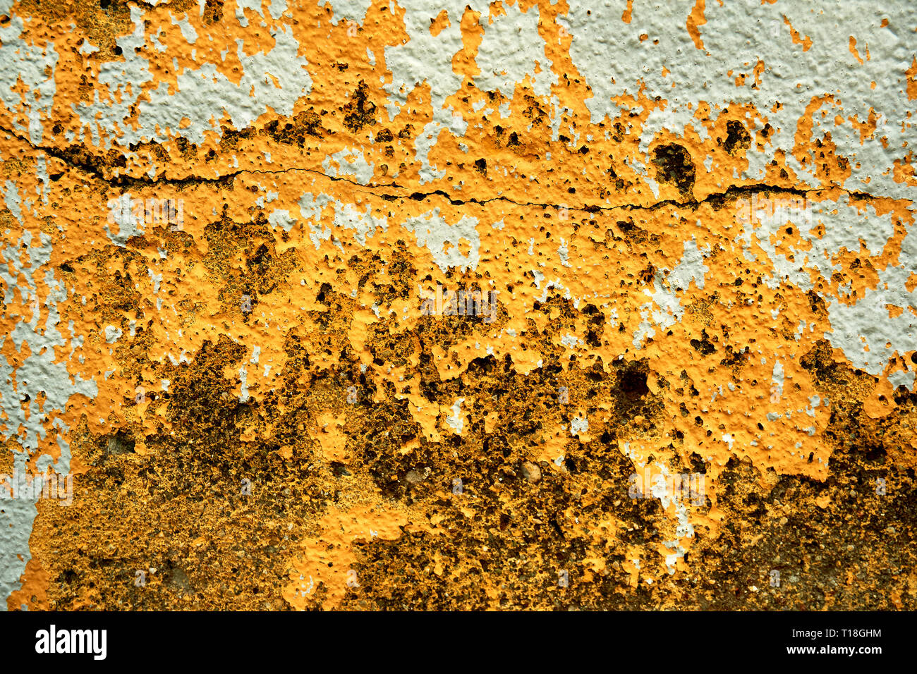 cracked color on a wall outside Stock Photo - Alamy