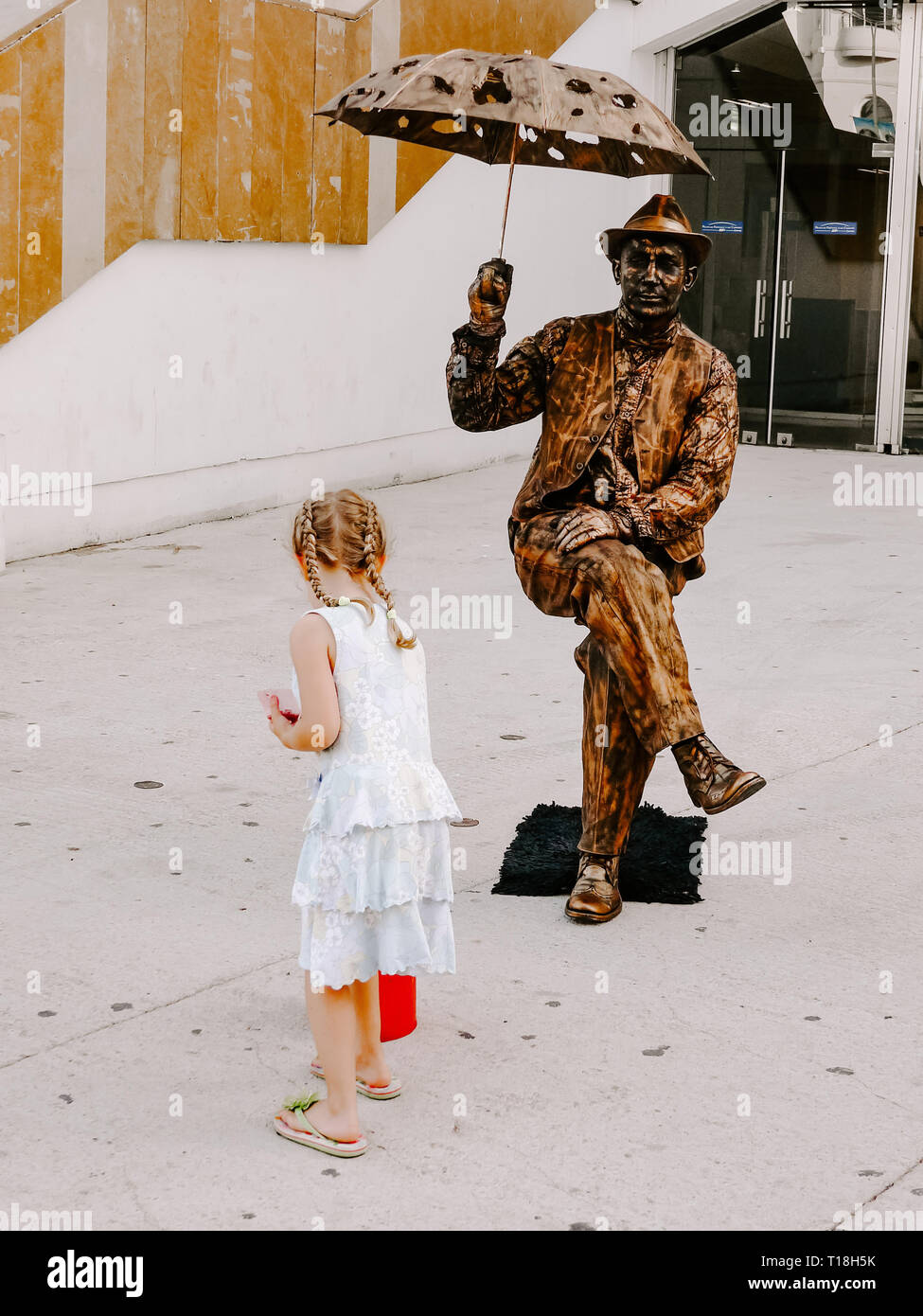 Donating money bucket hi-res stock photography and images - Alamy