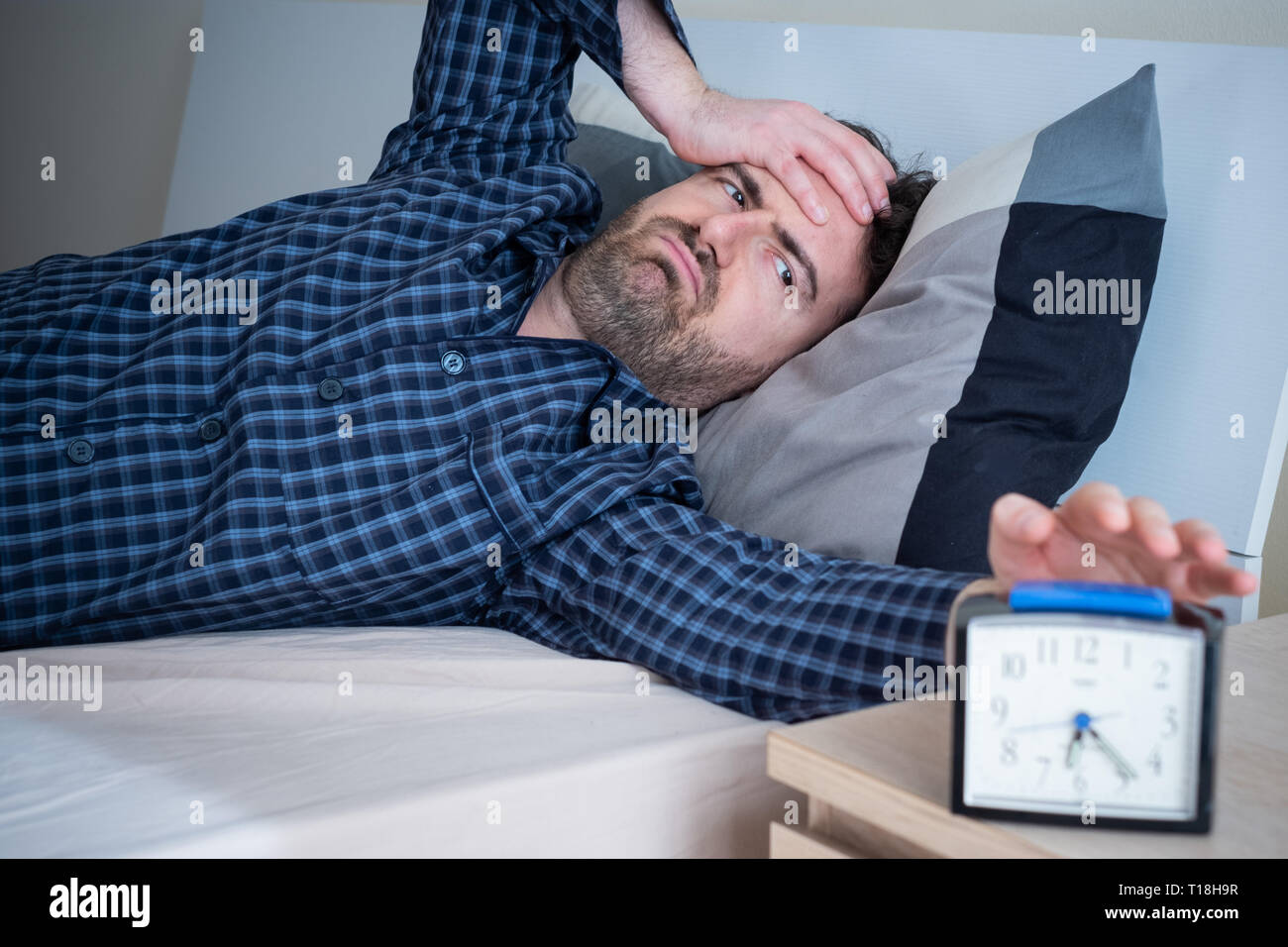 Angry man alarm clock in hi-res stock photography and images - Alamy