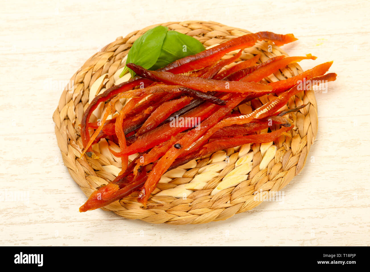 Salmon dry sticks snack Stock Photo - Alamy