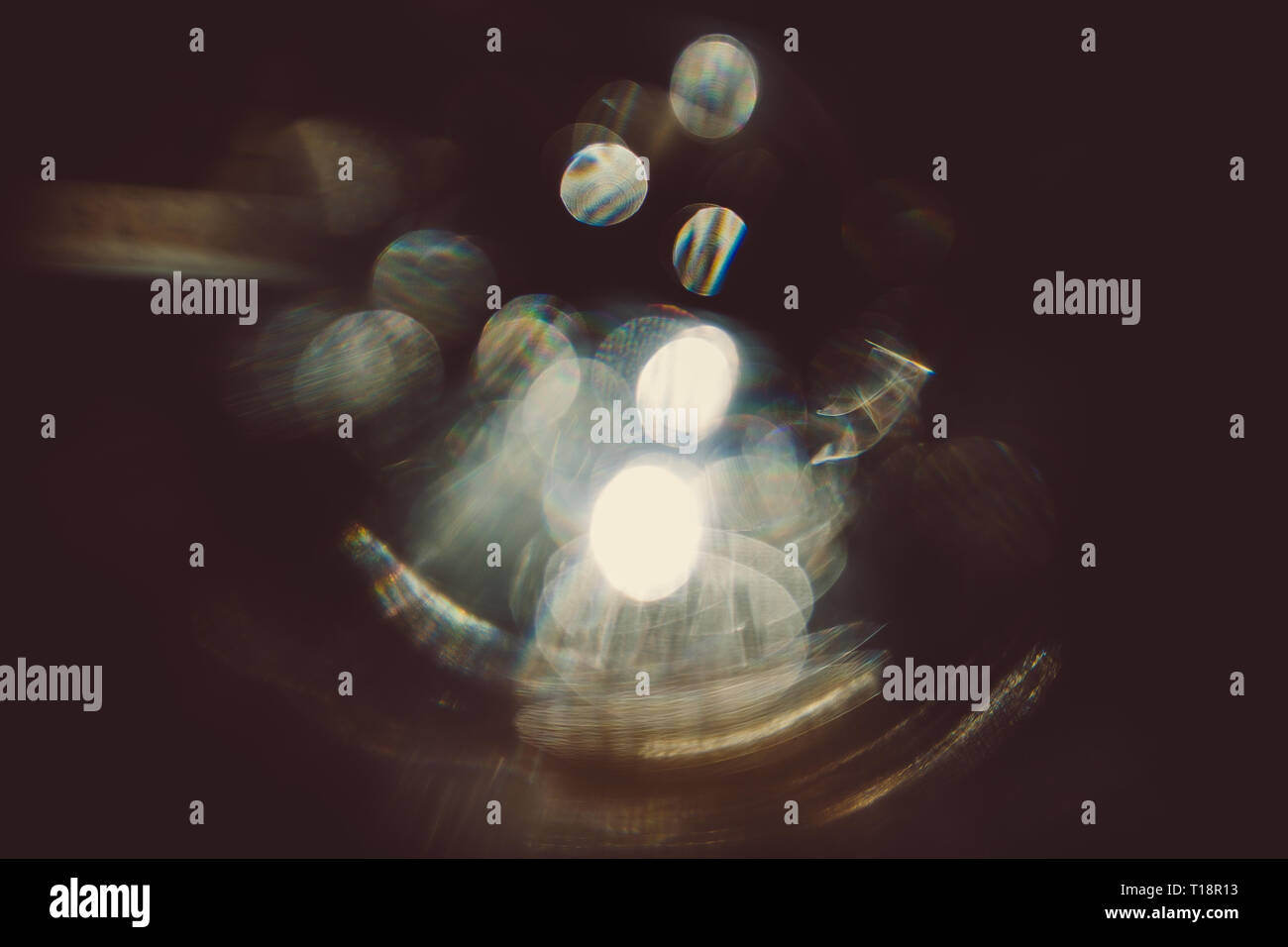 Real lens flare light effect on dark background. Sunlight refracted in ...