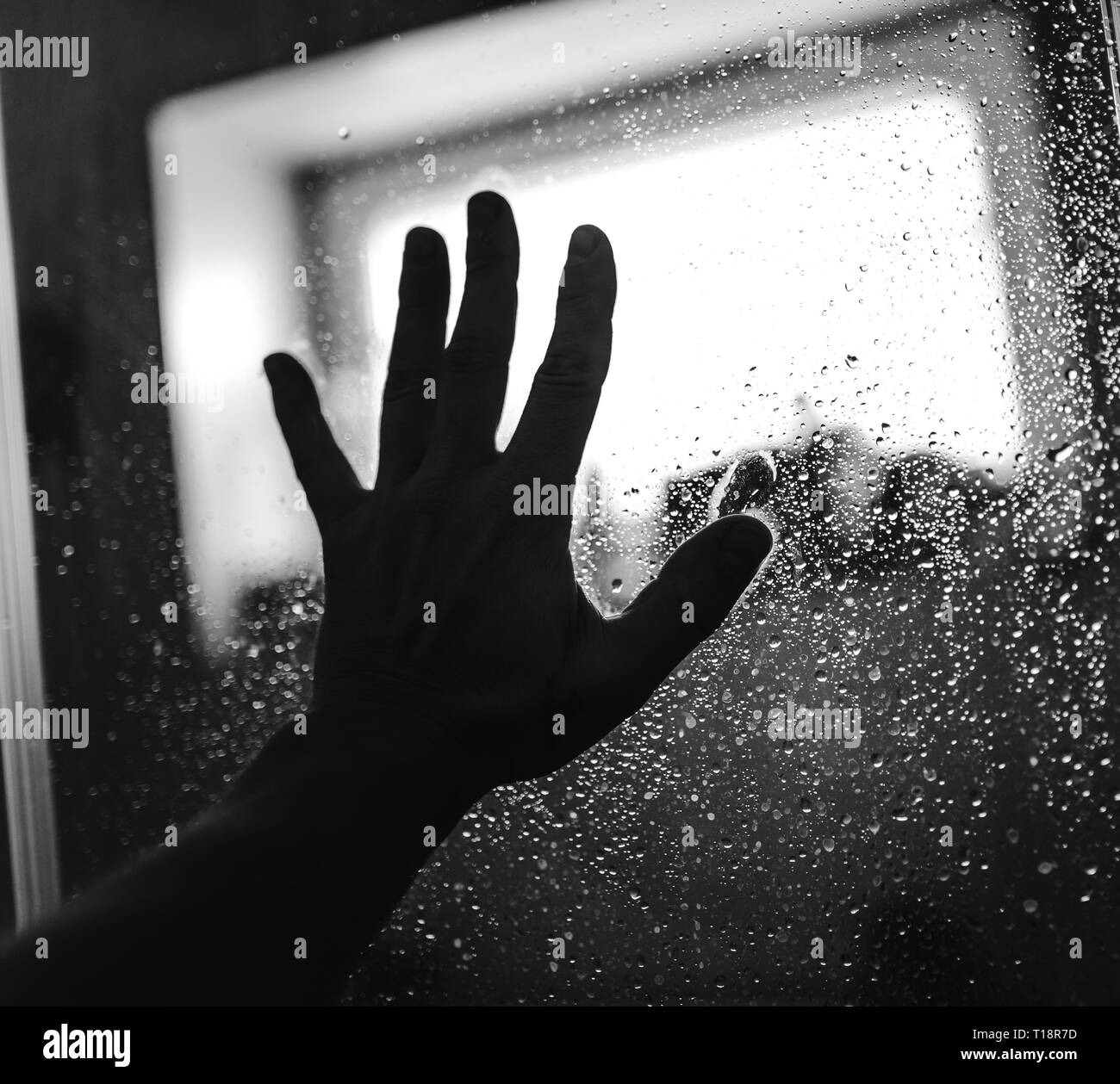 Closeup of condensation patterns on glass window, water droplets with ...