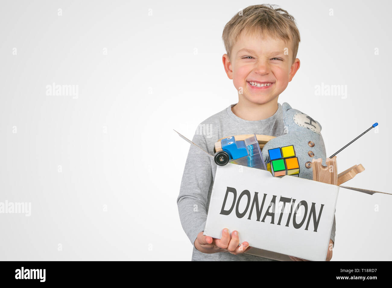 Children sharing toys hi-res stock photography and images - Alamy