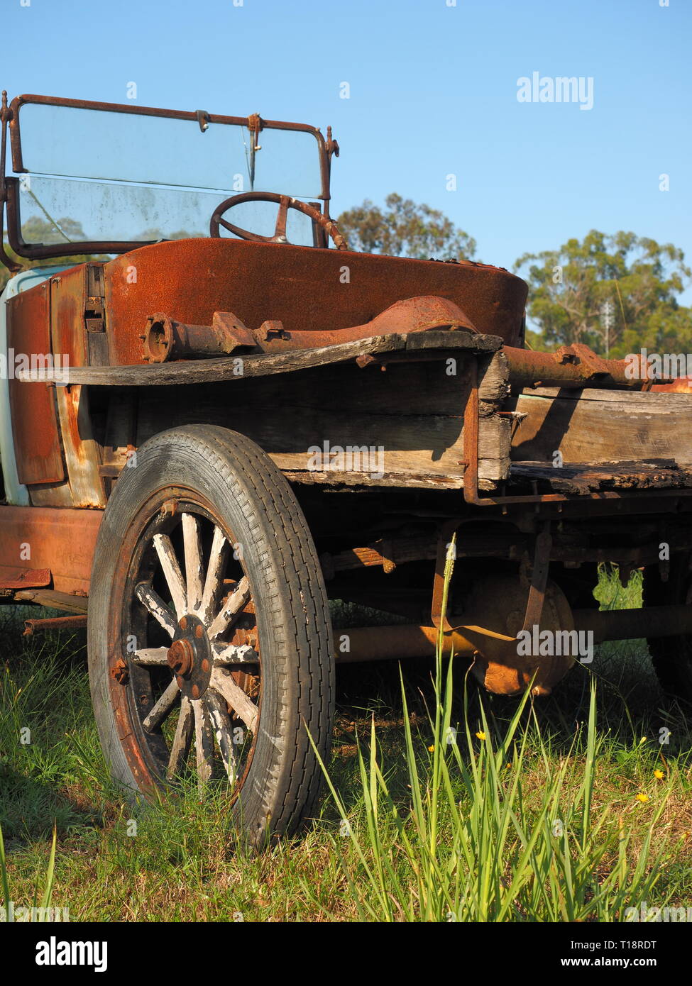 Old vehicle from days gone by. Rusting in the paddock the old machinery ...