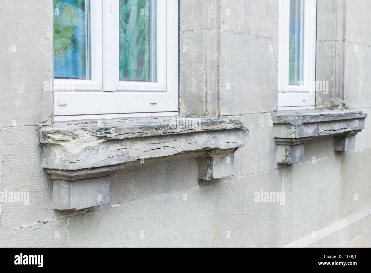 A damaged stone window back with chipped corners, Germany Stock Photo ...