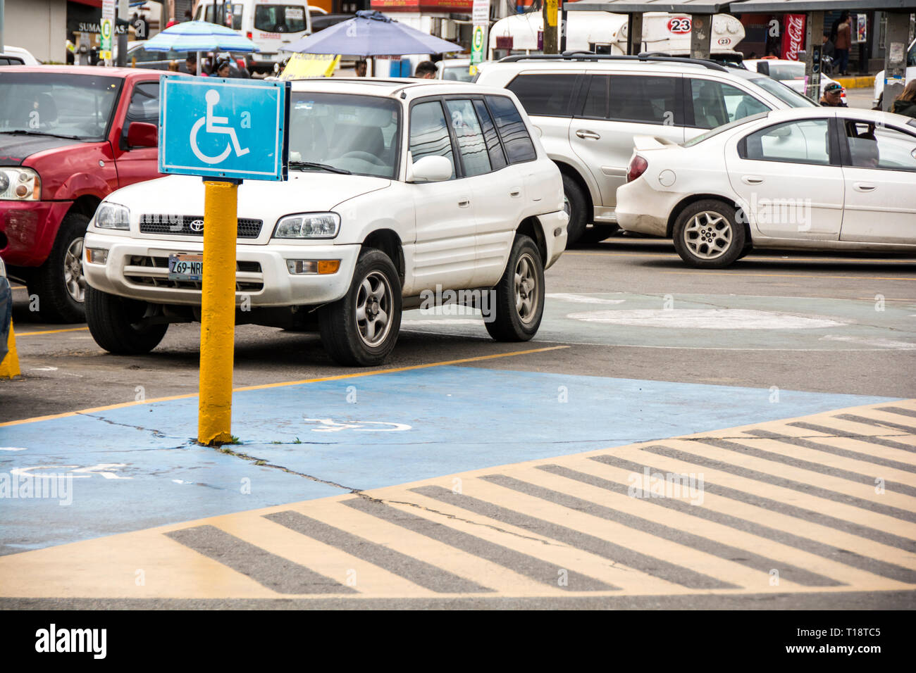 Handicapped parking space in a parking lot in the city of Ensenada ...