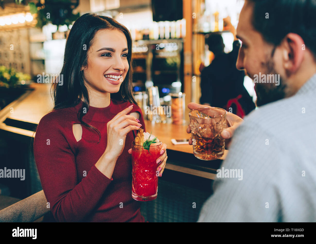 Guy looking at girl bar hi-res stock photography and images - Alamy