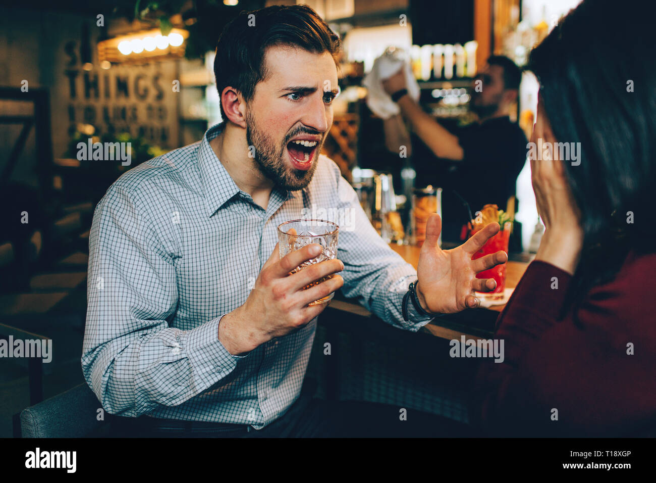 Bar alcohol men woman sad hi-res stock photography and images - Alamy