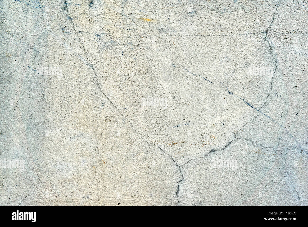 cracked color on a wall outside Stock Photo - Alamy