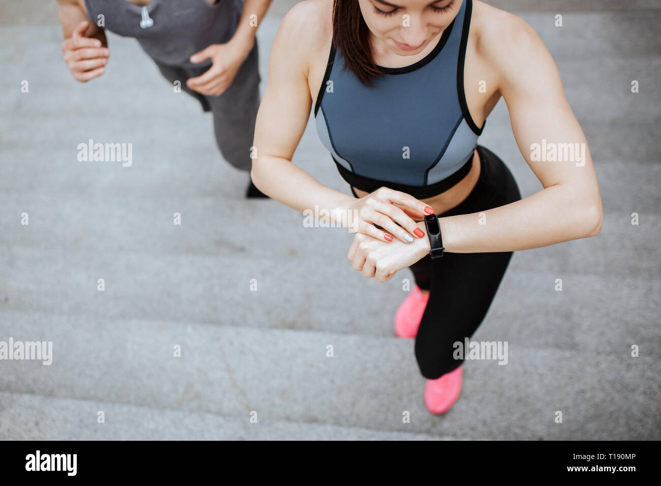 Man and woman going up steps hi-res stock photography and images - Alamy