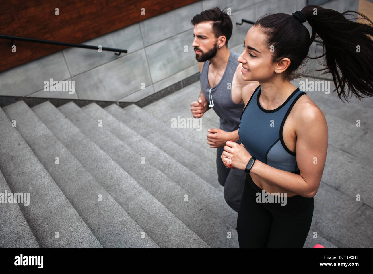 Man And Woman Going Up Steps High Resolution Stock Photography and ...