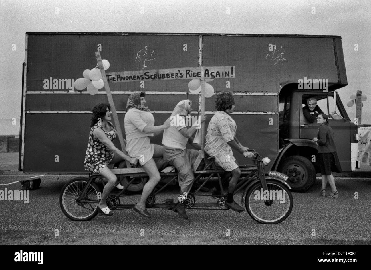 Isle of Man, Peel annual carnival 1970s. Group of men dressing up in ...