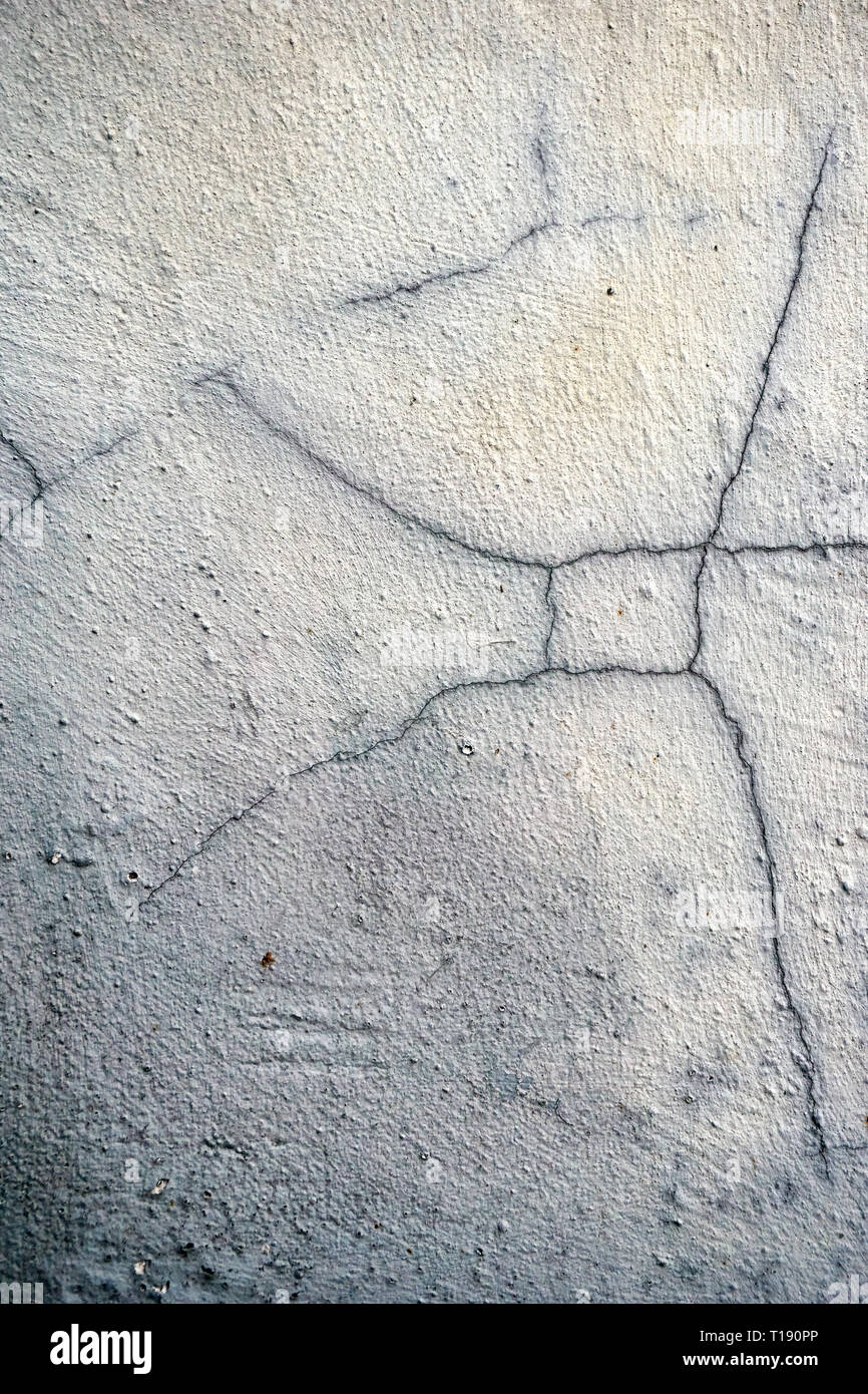 cracked color on a wall outside Stock Photo - Alamy