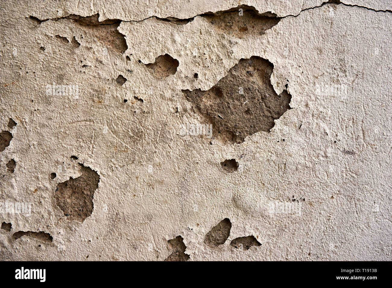 cracked color on a wall outside Stock Photo - Alamy