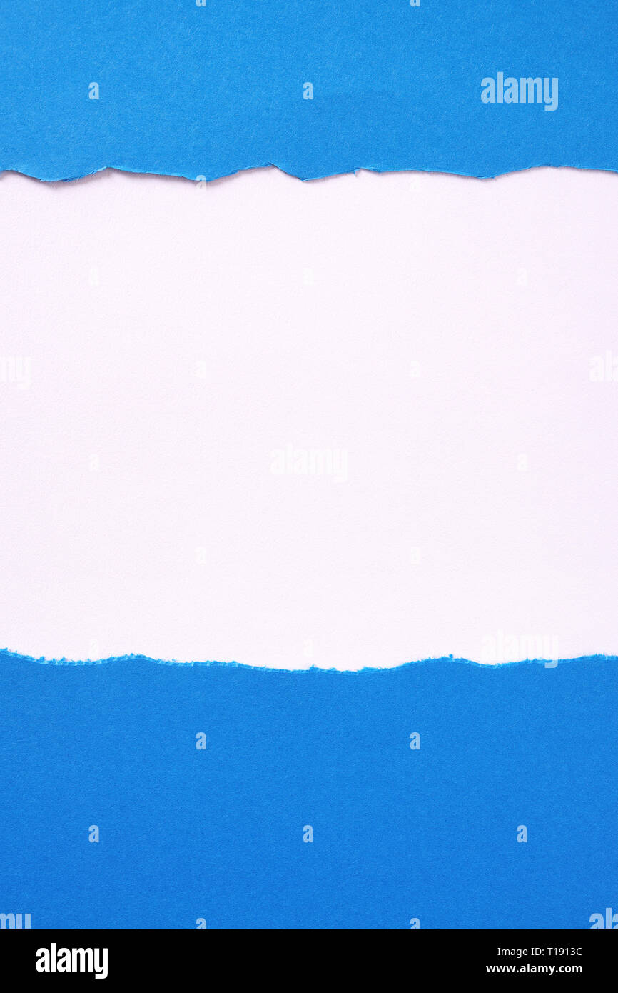 Torn blue paper white background border frame vertical Stock Photo - Alamy