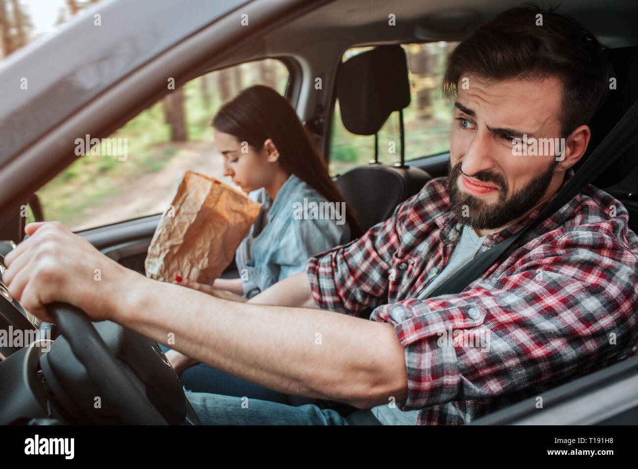 Man vomiting in bag hi-res stock photography and images - Alamy